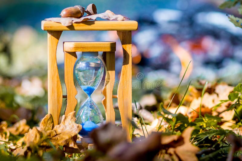 Sands Clock among Dry Autumn Leaves in Sunny Weather_ Stock Image ...
