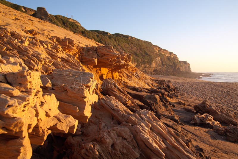 Sandstone beach stock photo. Image of beach, ocean, cliff - 19191998