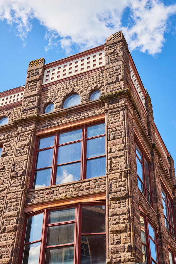 Sandstone Building Elegance with Arched Windows, Sunny Sky - Upward ...