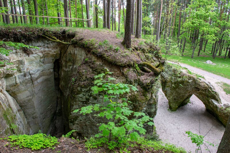 Sandstone Cave Entrance in Dark Stock Photo - Image of canyon, park ...