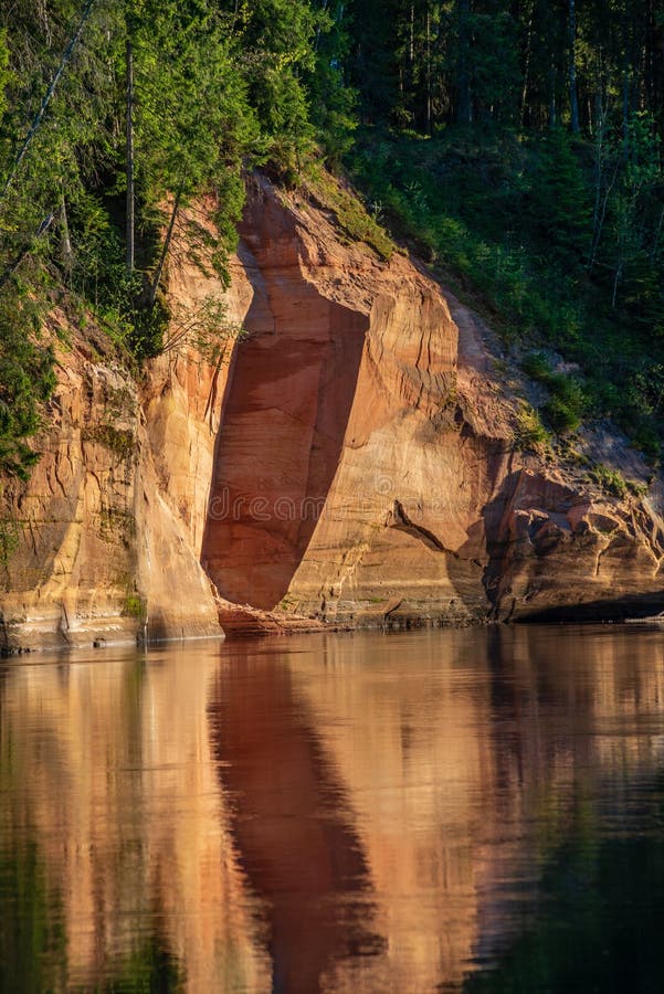 Sandstone Cliffs on the Shore of Forest River Stock Image - Image of ...