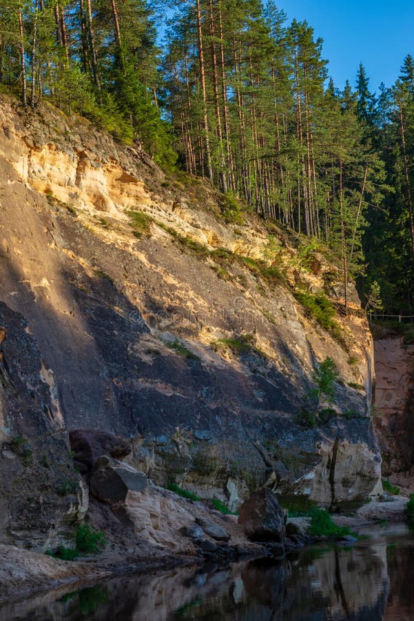 Sandstone Cliffs on the Shore of Forest River Stock Image - Image of ...