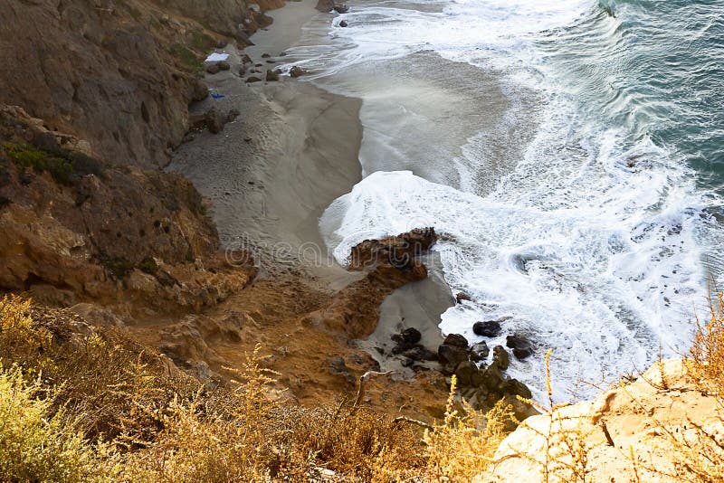 Sandstone Path Overlooking Cliff Side, Pacfic Ocean Waves on a Sandy ...