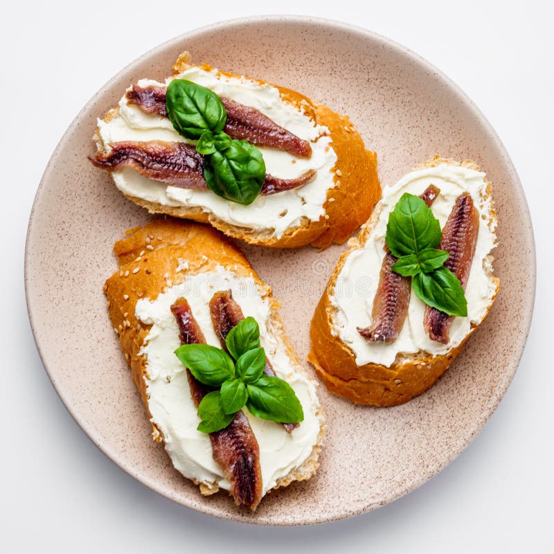 Sandwich with Anchovy Fillets on a Serving Tray on a White Background ...