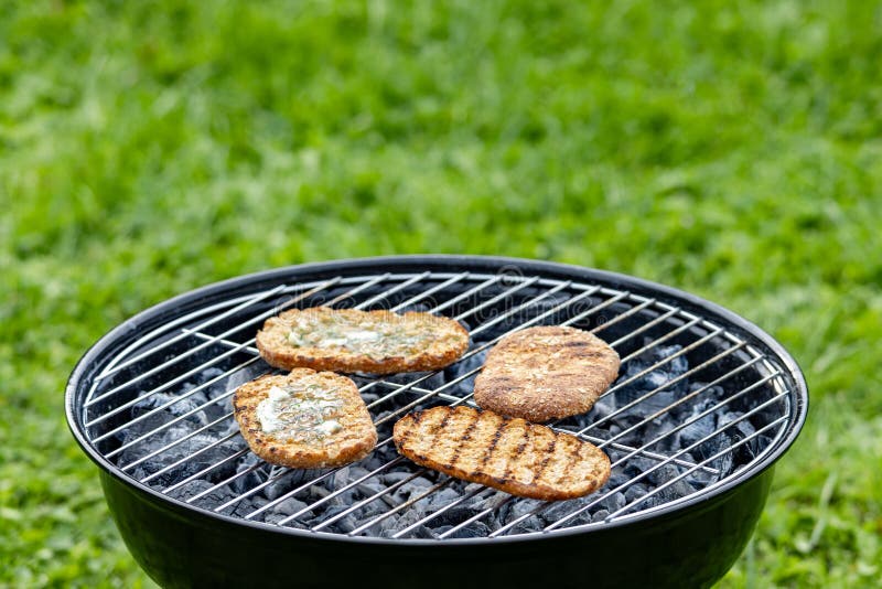 Bread buns on grill stock photo. Image of herb, grass - 333936956