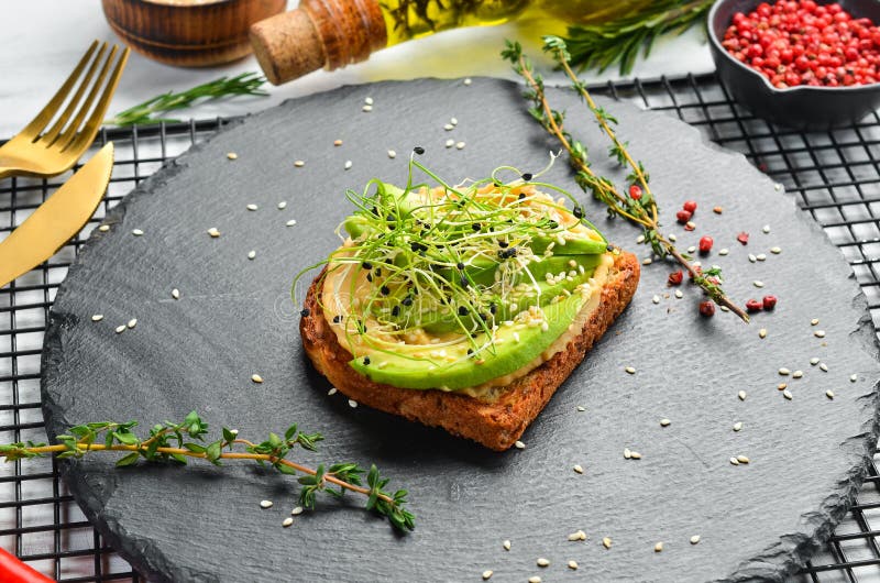 Sandwich: Ciabatta, Avocado, Hummus and Microgreen. Breakfast Stock ...