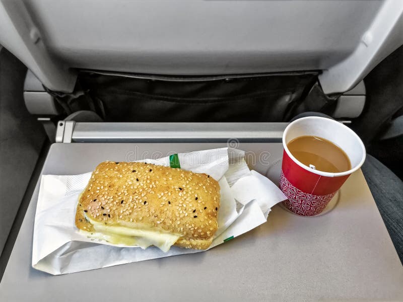 Sandwich and Coffee on Board the Plane Stock Photo - Image of business ...