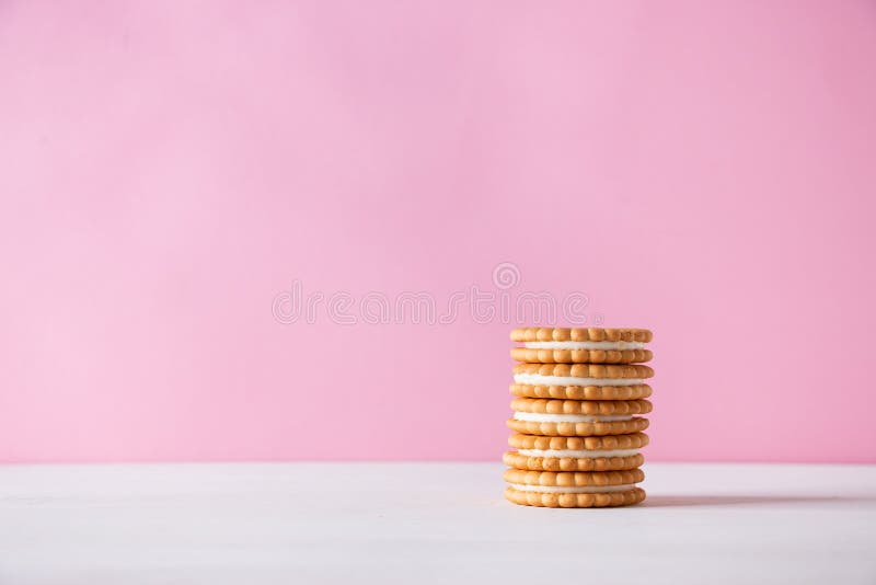 Sandwich Cookies on a Pink Background. the Concept of Breakfast and a ...