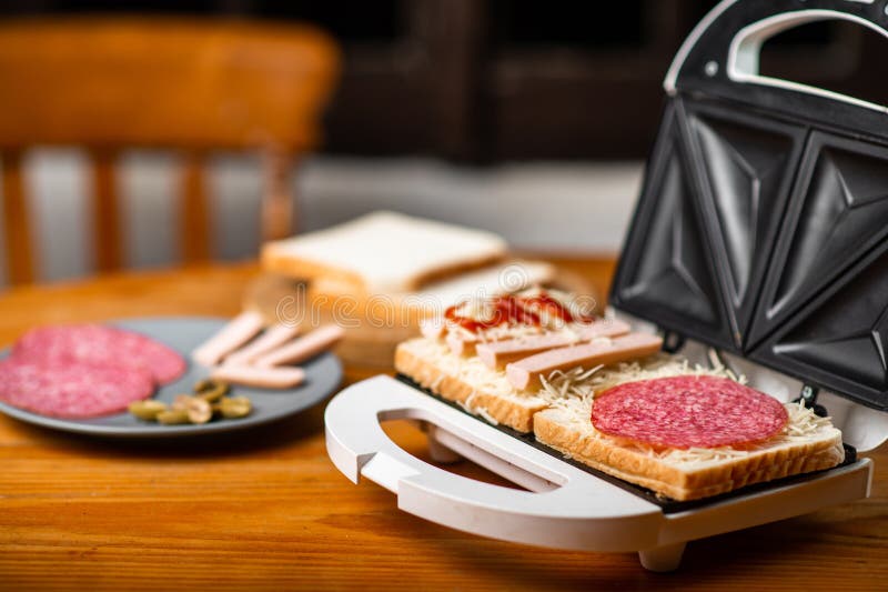 Sandwich Maker and Sandwich Making. Different Ingredients Lie Side by ...