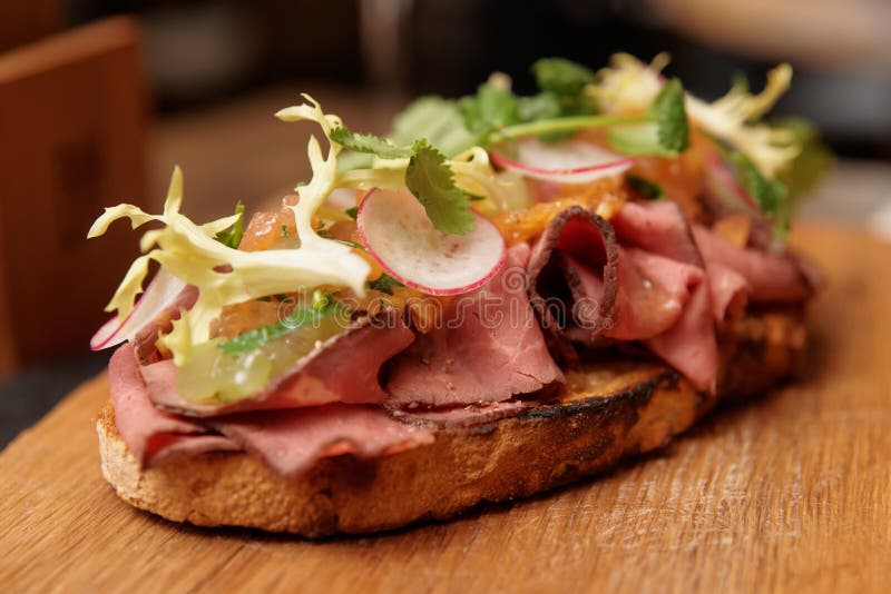 Roast Beef Starter with Arugula and Eggs on White Plate Stock Image ...