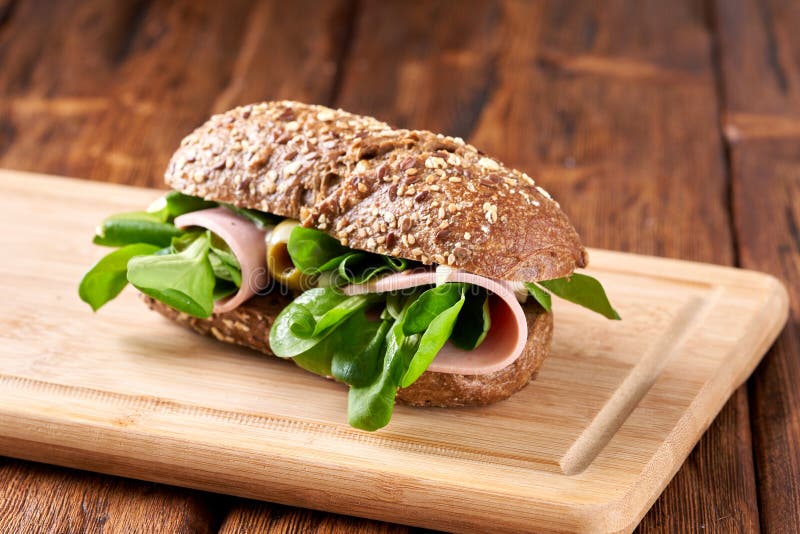 Sandwich with and Sausage on a Table Stock Photo - Image of cuisine ...