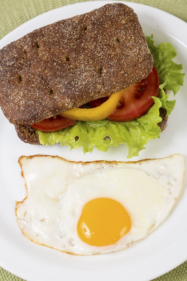 Sandwich with Vegetables and Half Baked Egg Stock Image - Image of ...