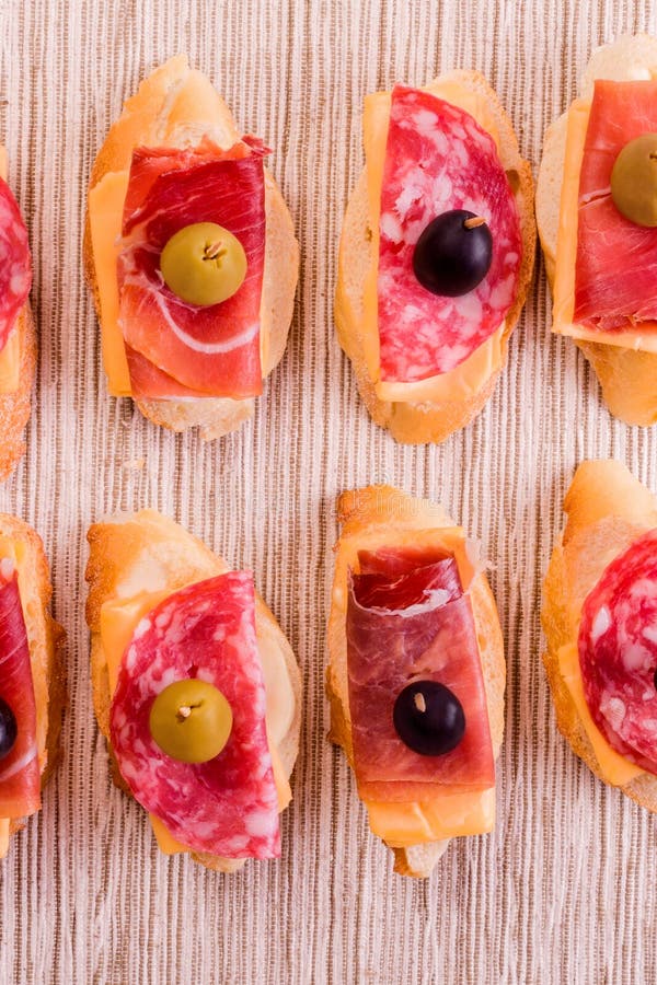 Sandwich of White Bread, in Two Rows, with Salami, Ham, Cheese a Stock ...