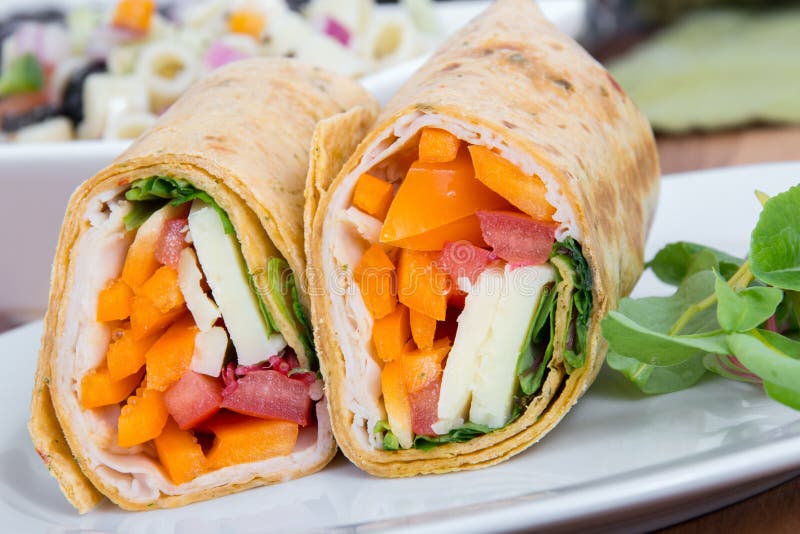 Sandwich Wrap Portion on Plate Stock Photo - Image of meal, vibrant ...