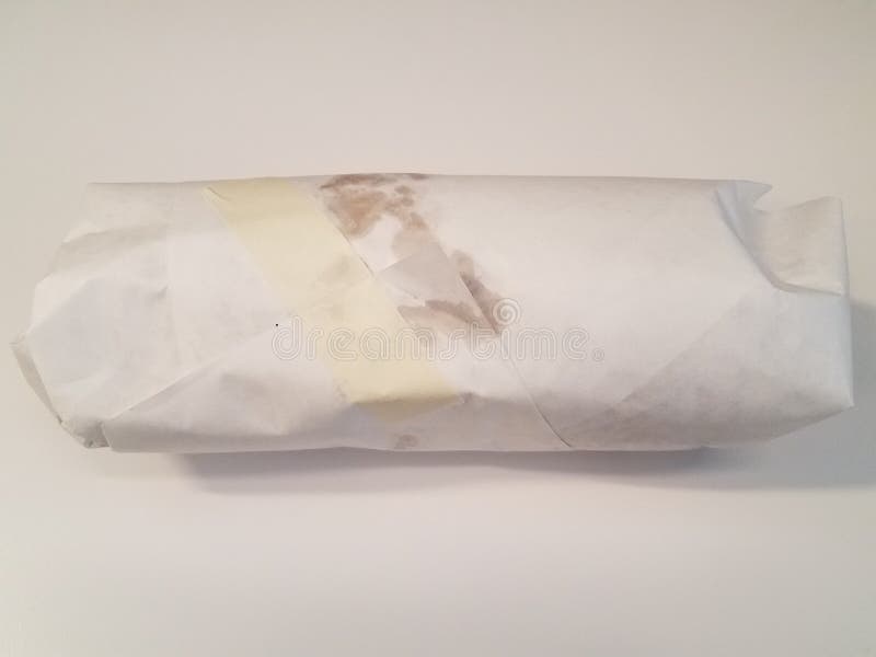 Sandwich Wrapped in Paper with Tape on White Surface Stock Image ...