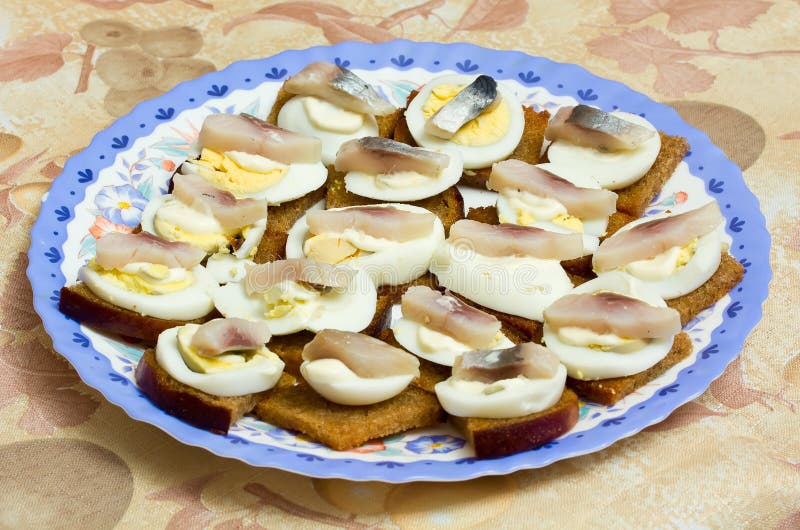 Sandwiches with Egg and Fish on a Plate Stock Photo - Image of lemon ...