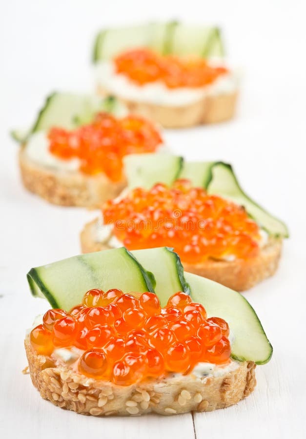 Sandwiches with Red Caviar and Cream Cheese Stock Photo - Image of ...