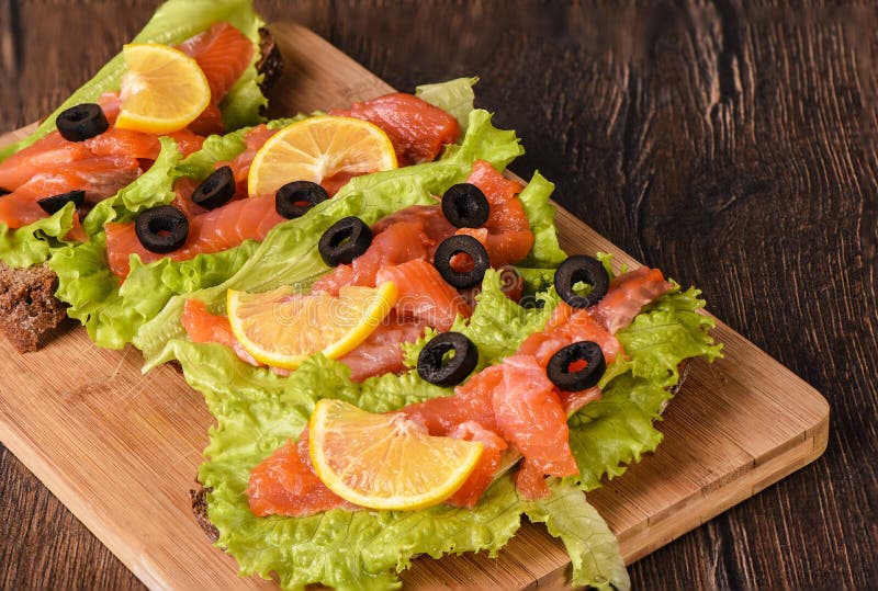 Sandwiches with Red Fish and Lettuce Stock Photo - Image of cooking ...