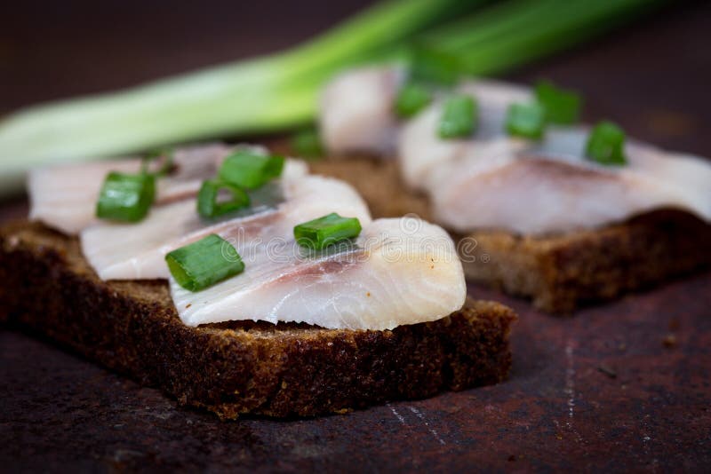 Sandwiches of Rye Bread and Herring. Pieces of Fish are Herring Stock ...