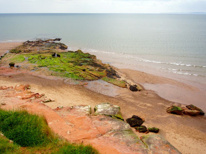 Sandy Bay - Devon stock photo. Image of england, rock - 100227306