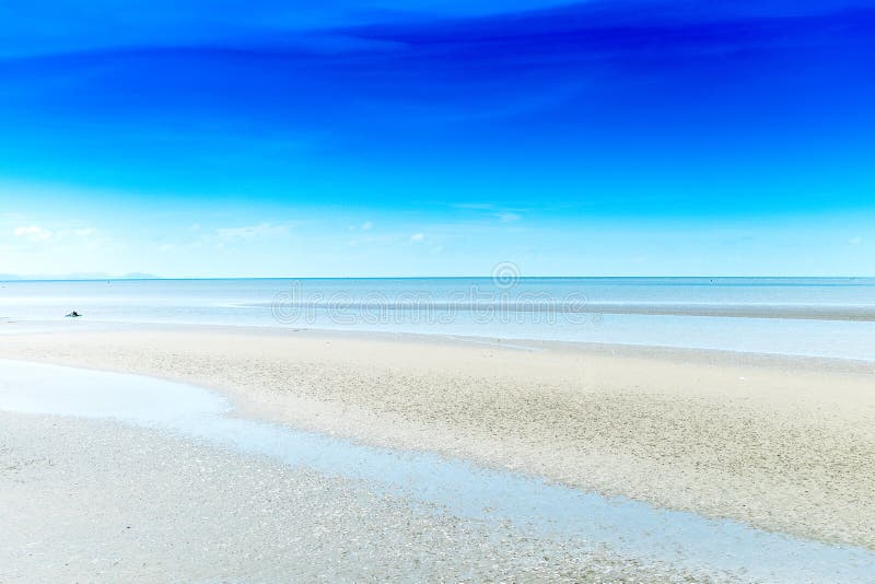 Sandy Beach and Blue Sea with Waves Stock Image - Image of black ...