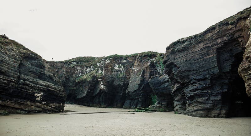 Sandy Beach with a Cave in Marbella, Spain Stock Photo - Image of stone ...