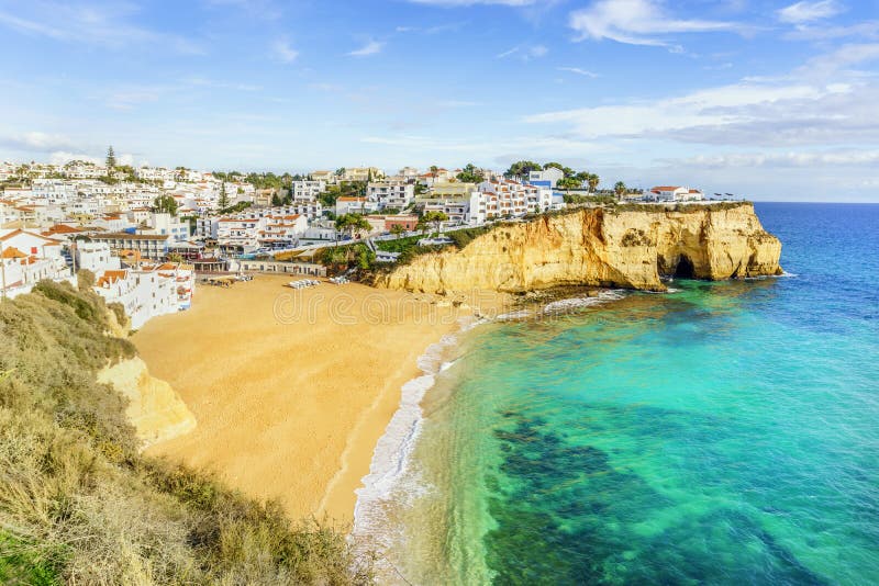 Sandy Beach between Cliffs in Front of White Architecture of Car Stock ...