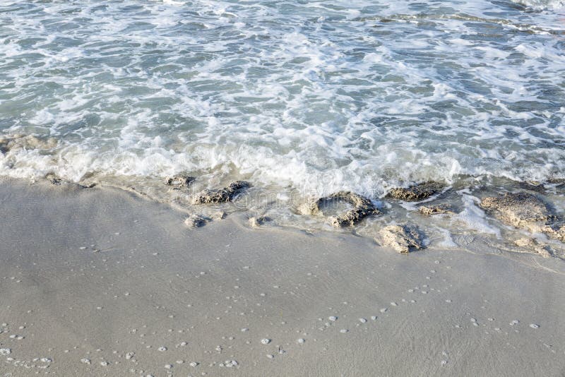 Sandy Beach with Foam from the Wave. the Beauty of Nature and ...
