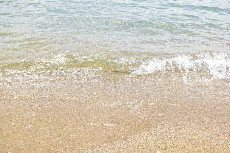 Sandy Beach in Greece with Clear Water and Waves. Stock Photo - Image ...