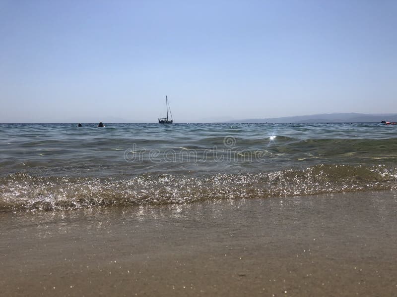 Sandy Beach in Greece with Clear Water Stock Photo - Image of surface ...