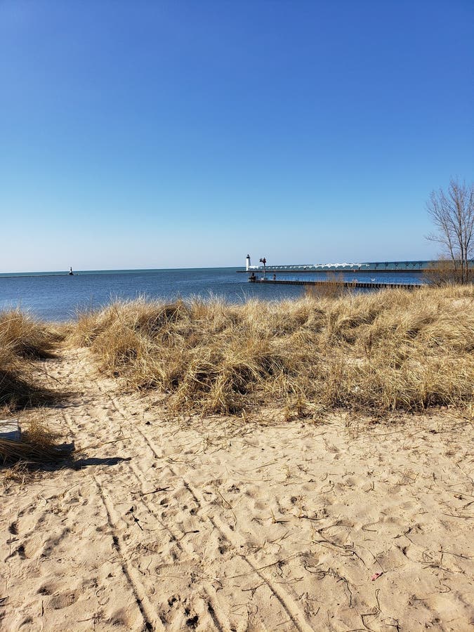 Sandy beach at the pier stock photo. Image of sandy - 177023264