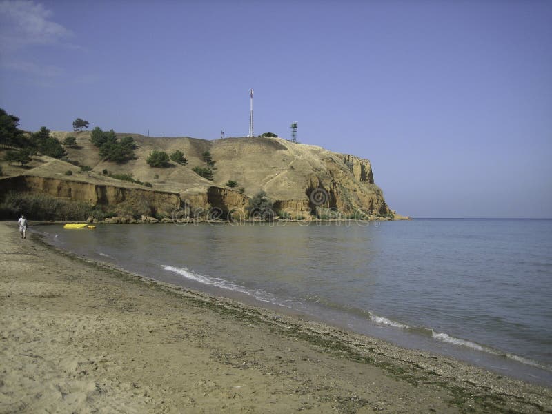 Sandy Beach in Quiet Sunny Weather. Weak Surf Caressing the Coastal ...