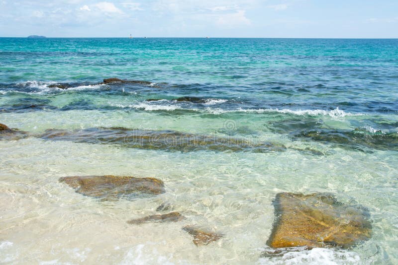 Sandy Beach with Rocks and Crystal Clear Water Stock Image - Image of ...