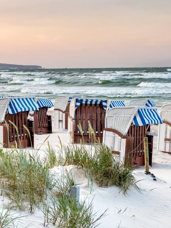 Sandy Beach by the Sea with Dressing Rooms. Stock Image - Image of ...
