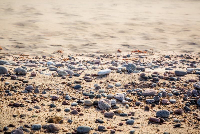 Sandy Beach with Small Pebbles and Smooth Water, Selective Focus. Stock ...
