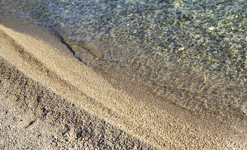 Sandy Beach Splashing with Crystal Clear Sea Water Stock Photo - Image ...