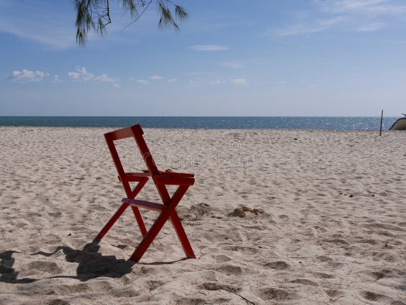 Sandy Beach, Stool and Ocean Stock Photo - Image of ocean, sunny: 84466308