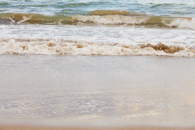 Sandy Beach on a Sunset with Reflection on Wet Sand and Waves with Foam ...