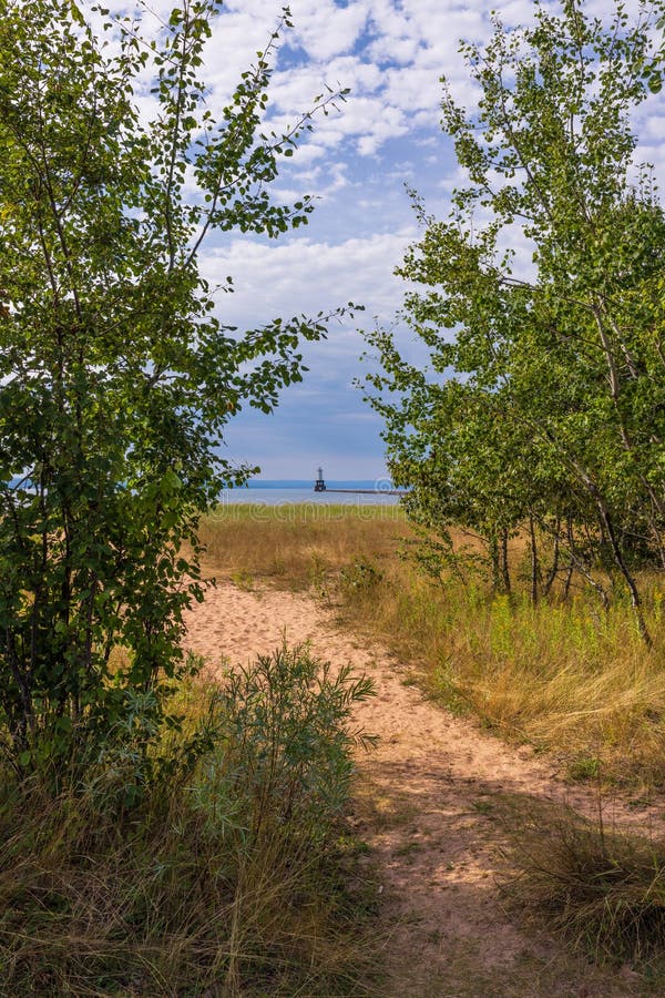 Beach Trail To Breakwater Lighthouse on Lake Superior Stock Image ...