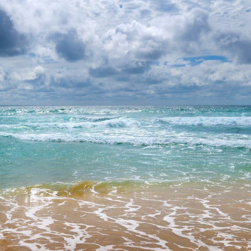 Sandy Beach of the Tropical Ocean and the Overcast Sky with Dram Stock ...