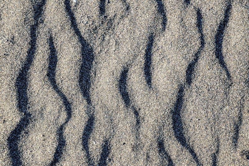 A Sandy Beach with a Wave Pattern Stock Photo - Image of sandy ...