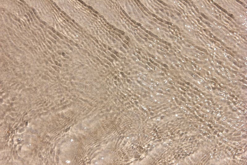 Sandy Bottom through Clear Sea Water. Texture and Background Stock ...