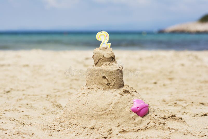 Sandy cake on a beach stock image. Image of delicious - 57152109