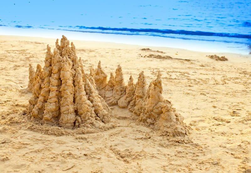 Sandy Castle at the Sea Edge Stock Image - Image of beach, fort: 24684851