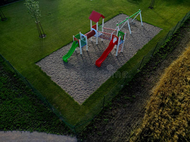 Sandy Children Playground Bordered by Tree Trunks and Sandstone ...
