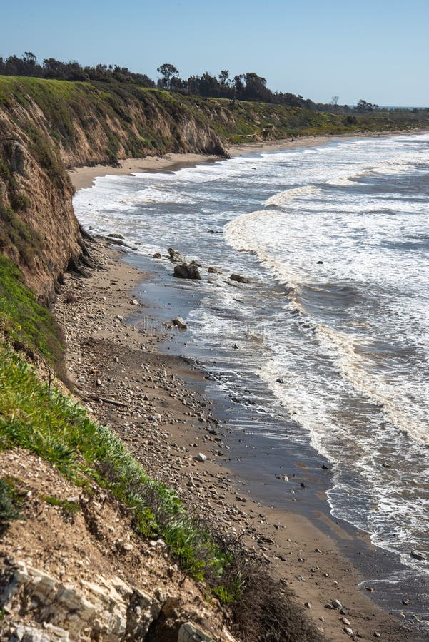 Sandy Cliffs Drop To the Pacific Surf Below Stock Image - Image of ...