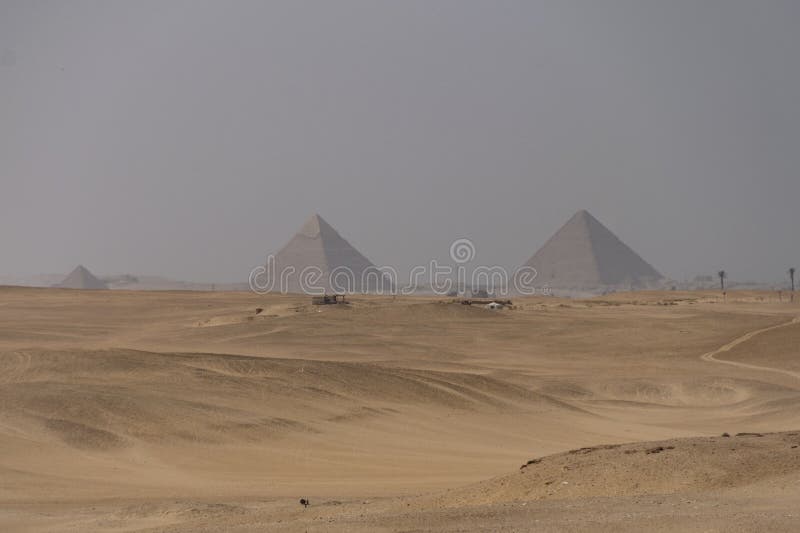Sandy Desert with Giza Pyramids in the Background Stock Image - Image ...