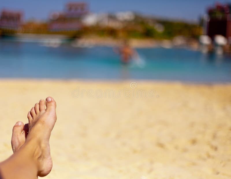 Sandy feet on the beach stock image. Image of nature - 22373155