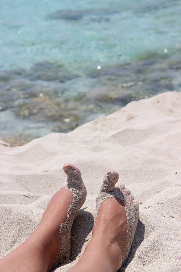 Sandy feet on the beach stock photo. Image of caribbean - 57094234