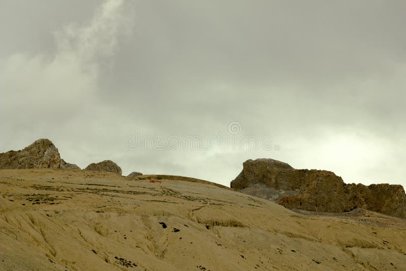 A Sandy Mountains Hill with Rocks Stock Photo - Image of cloud ...